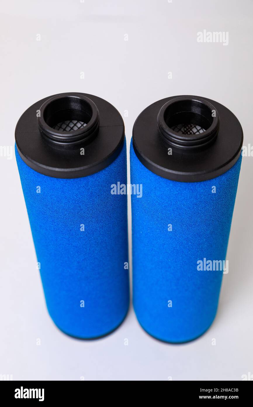 Air filters for a compressor with foam rubber, on a white backgroun ...