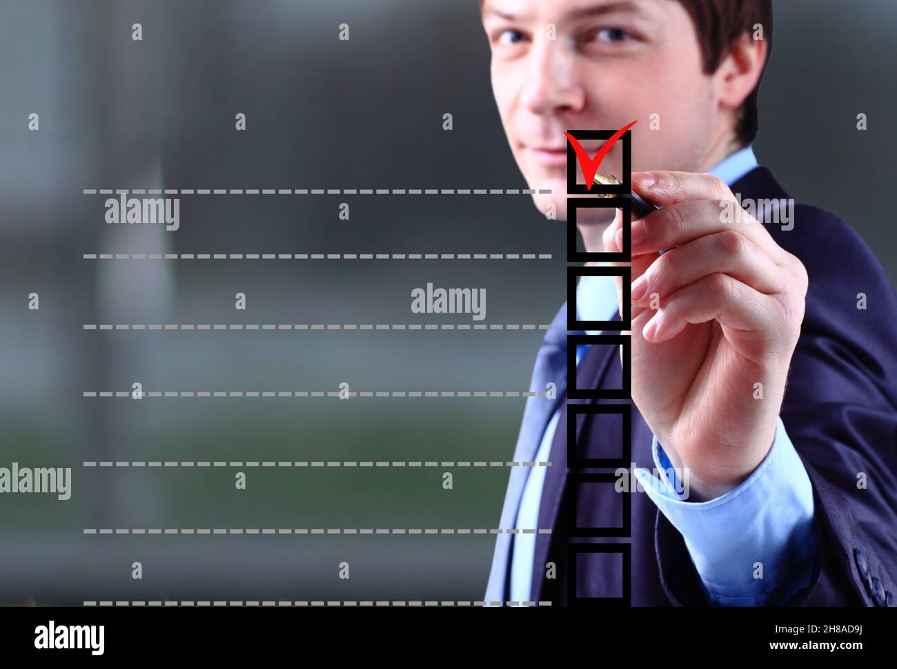 business man hand choose check mark on box Stock Photo - Alamy