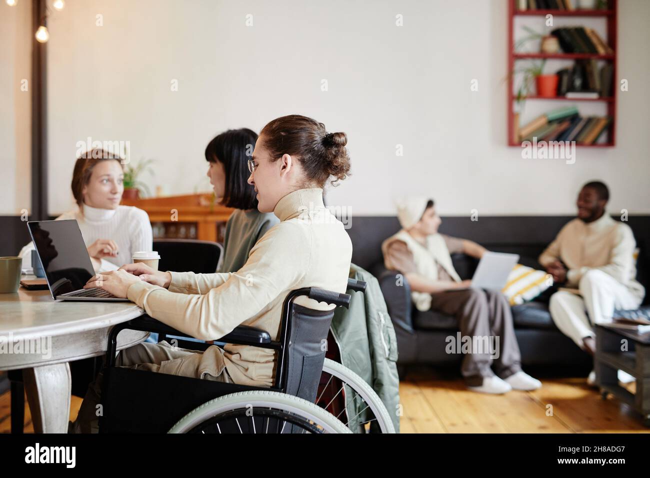 College students study wheelchair hi-res stock photography and images ...
