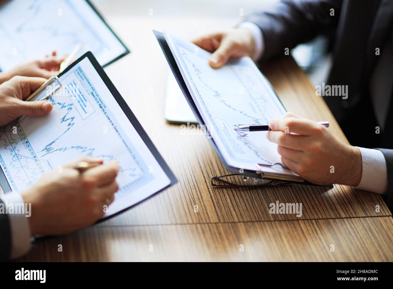 Banking business or financial analyst desktop accounting charts, pens ...