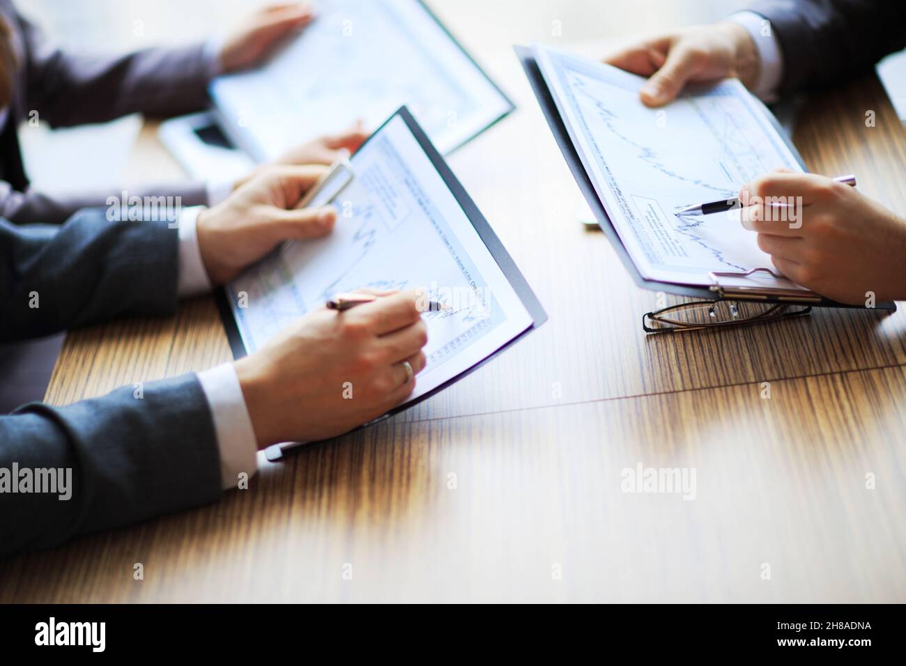 Banking business or financial analyst desktop accounting charts, pens ...