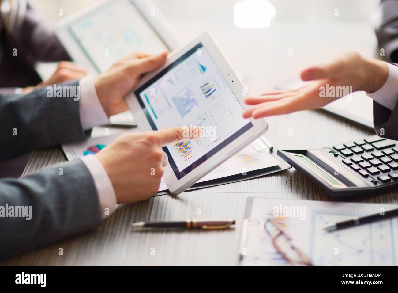 Businessman on online Financial Assessment. Team work in the office ...