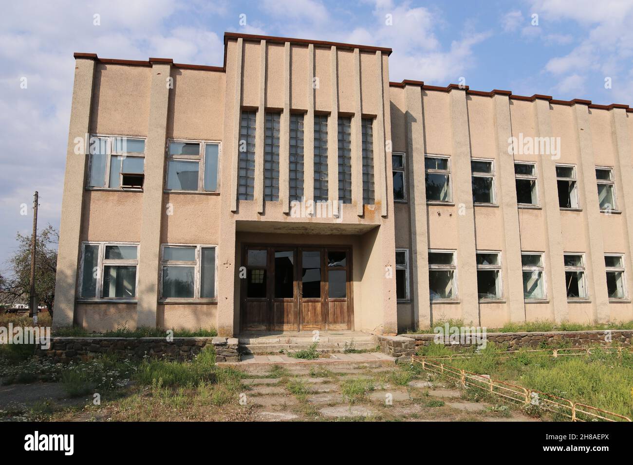Old abandoned office building with broken windows Stock Photo - Alamy