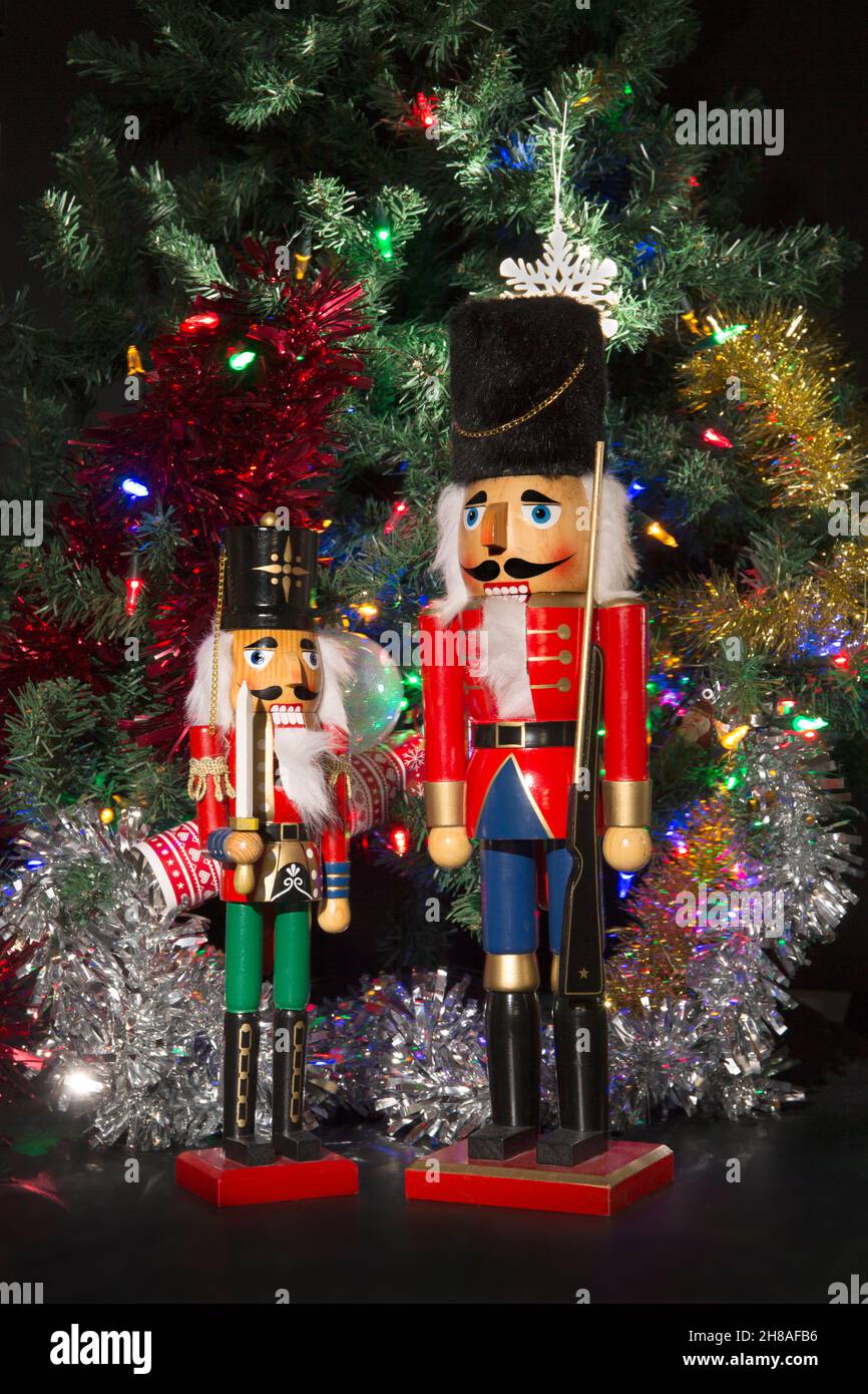Christmas Nutcrackers with Tinsel and Christmas Tree Stock Photo - Alamy