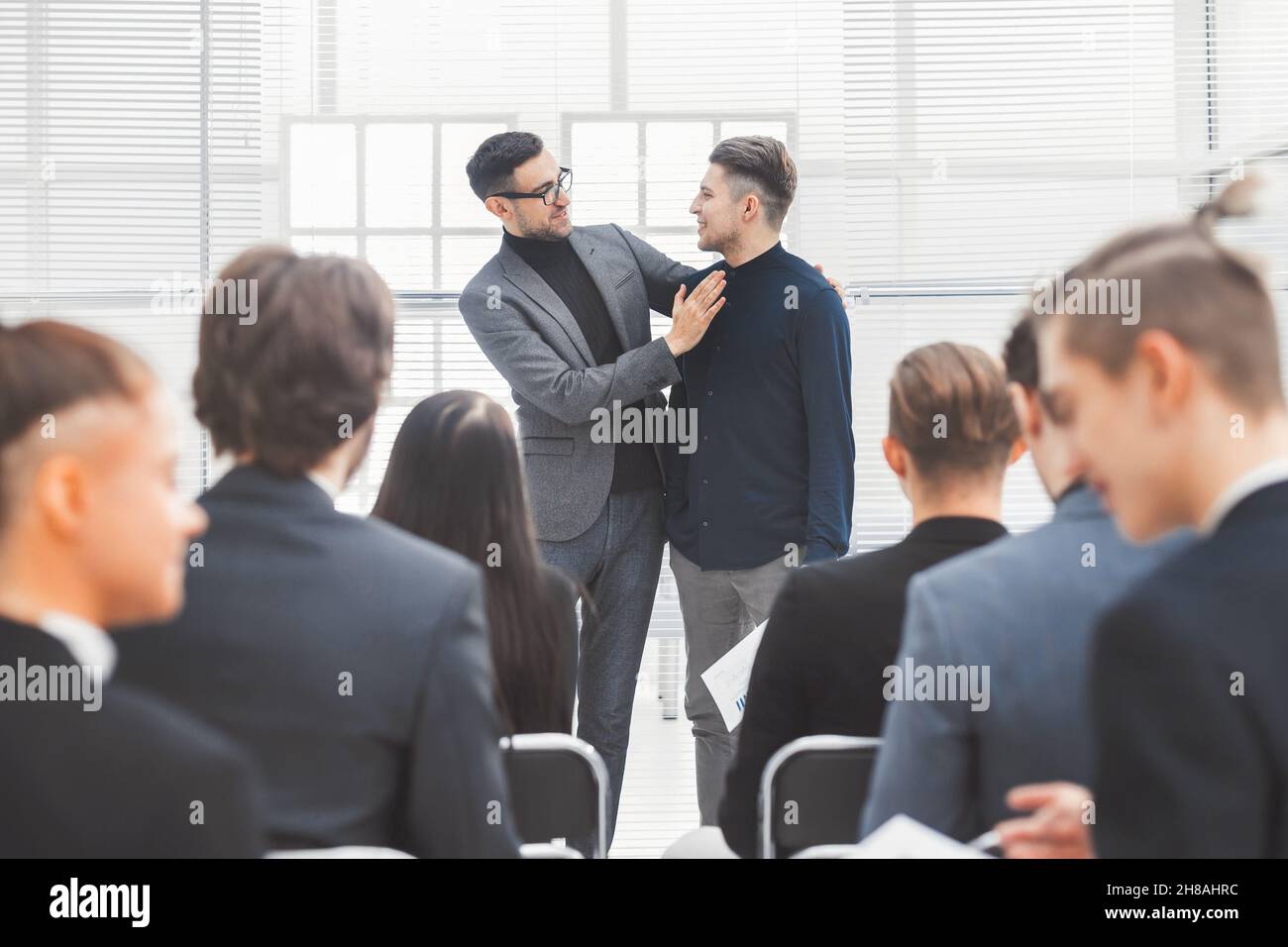 project Manager introducing a new employee .photo with a copy of the ...