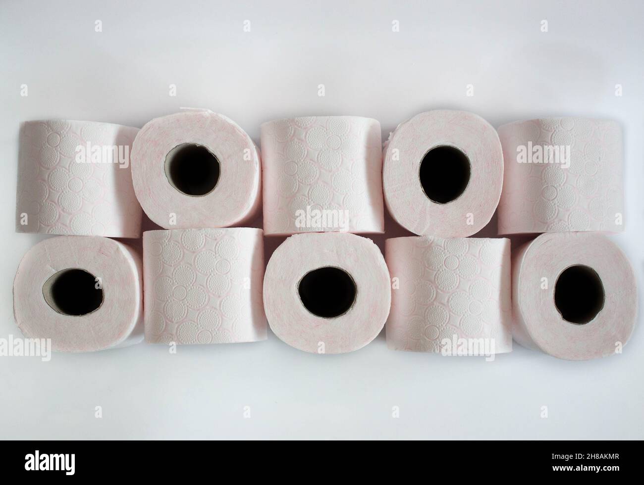 pink patterned tissue paper rolls , toilet paper rolls isolated on ...