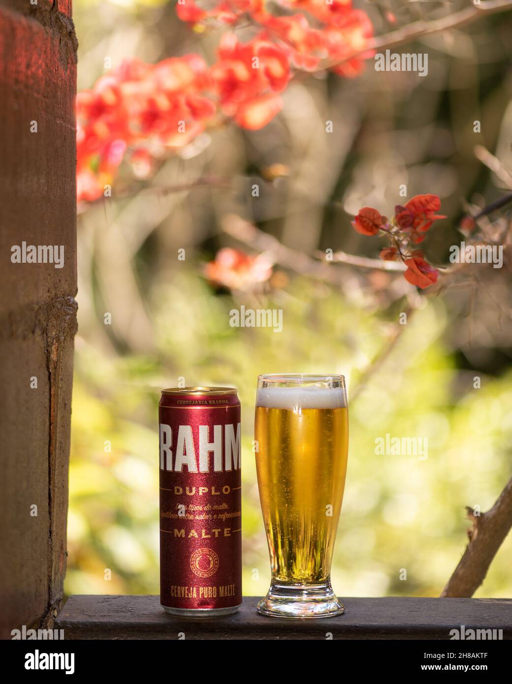 Petropolis, Rio de Janeiro, Brazil- September 4, 2021: A bottle and a glass of Brahma beer ...