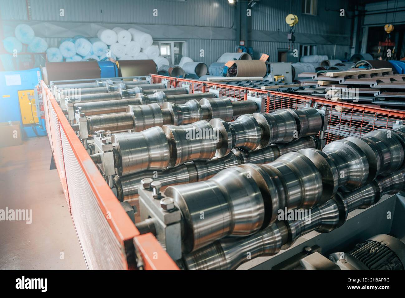 Production line of metal tile for roof. Steel forming machine in ...