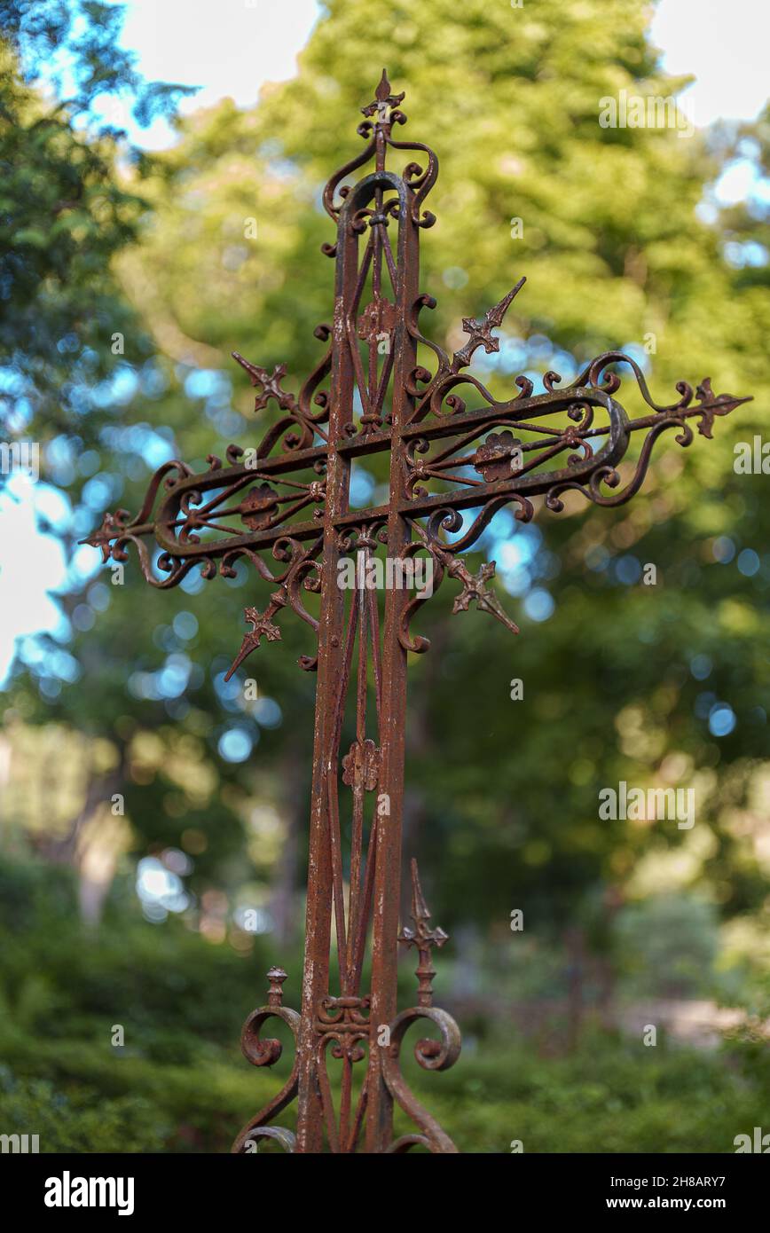 Old abandoned rusty cross in the cemetery Stock Photo - Alamy
