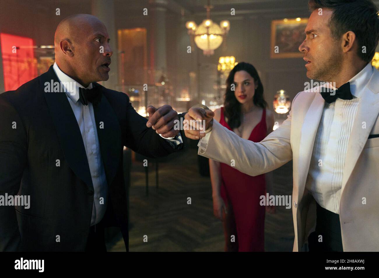 Red Notice is a 2021 American action comedy film written and directed ...