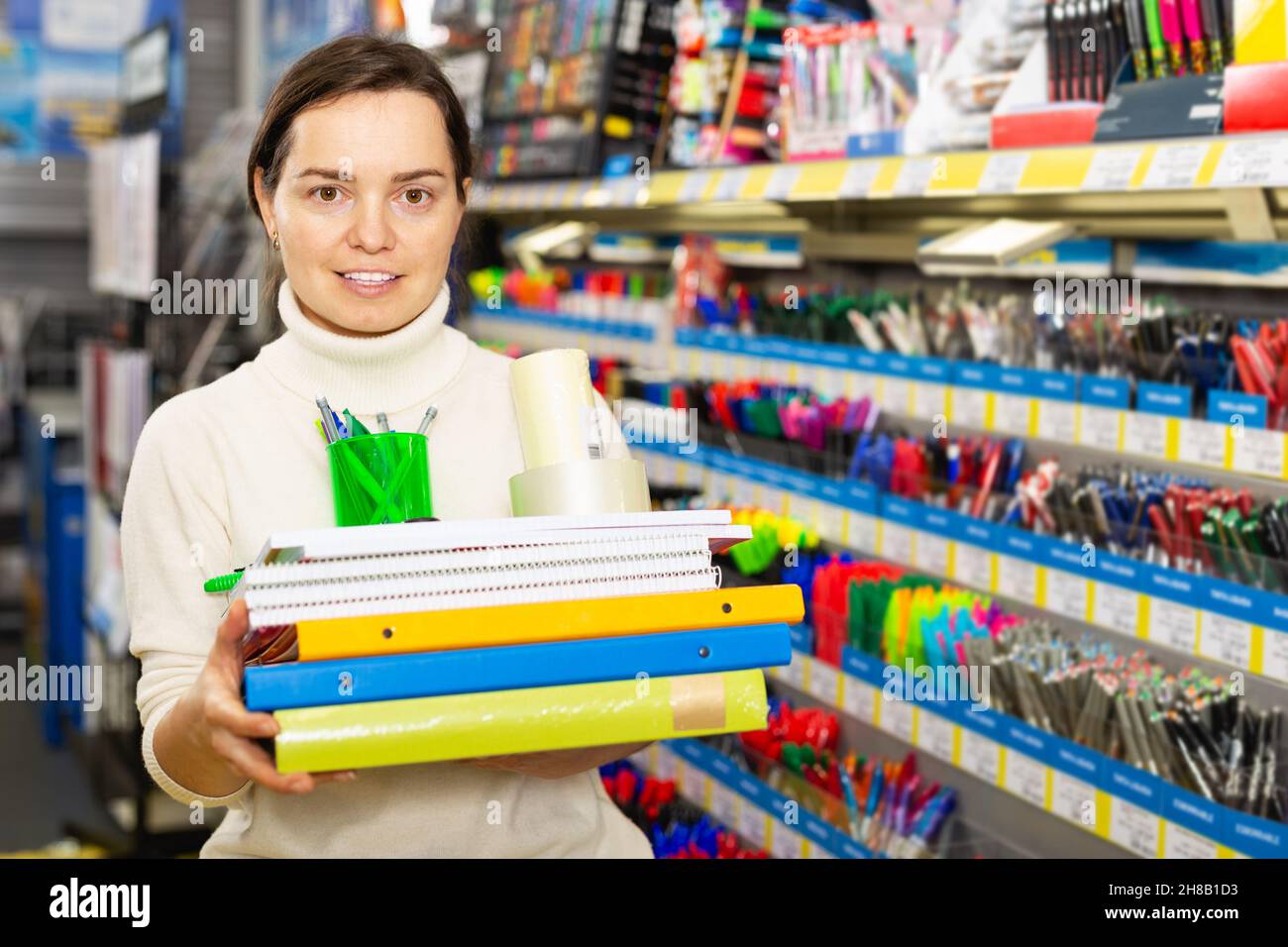 Woman choosing office supplies hi-res stock photography and images - Alamy