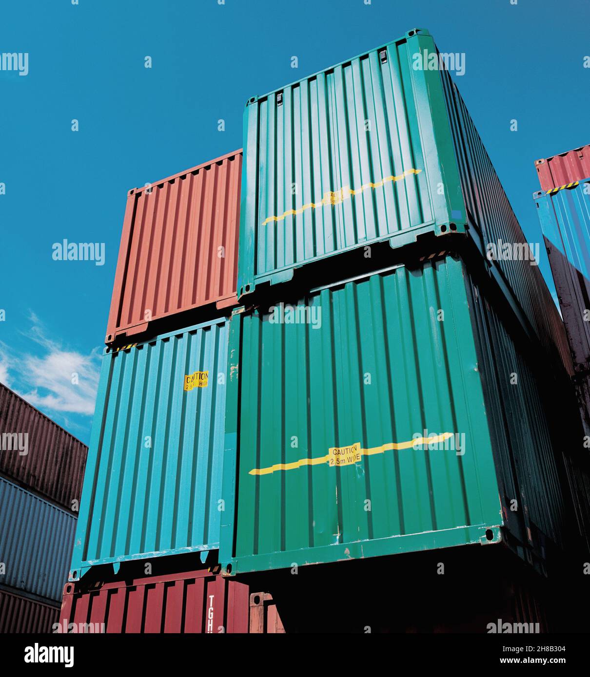 Shipping containers in shipyard Stock Photo - Alamy