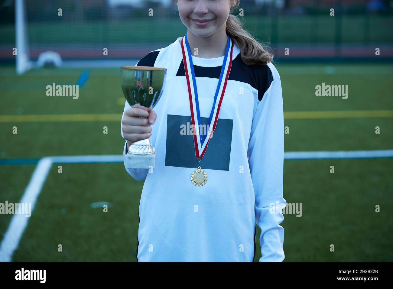 Female gold trophy hi-res stock photography and images - Alamy