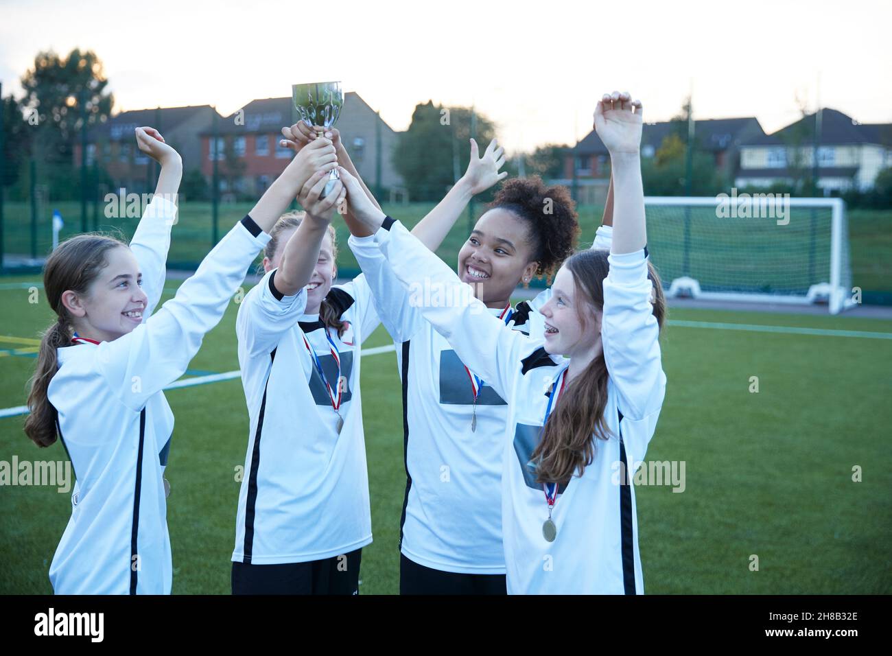 Girl in uniform with trophy hi-res stock photography and images - Alamy