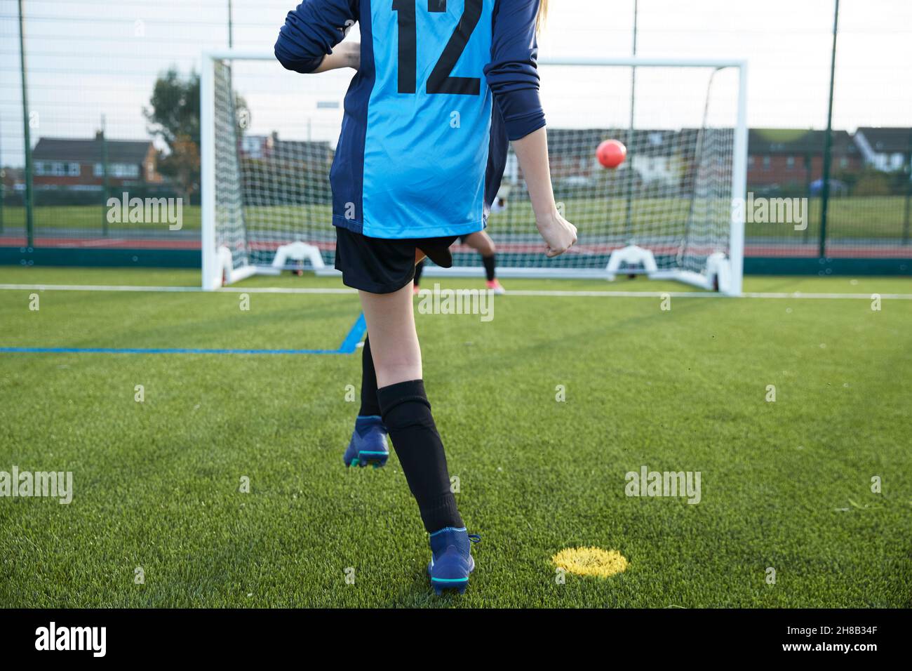 Girls playing soccer in field hi-res stock photography and images - Alamy