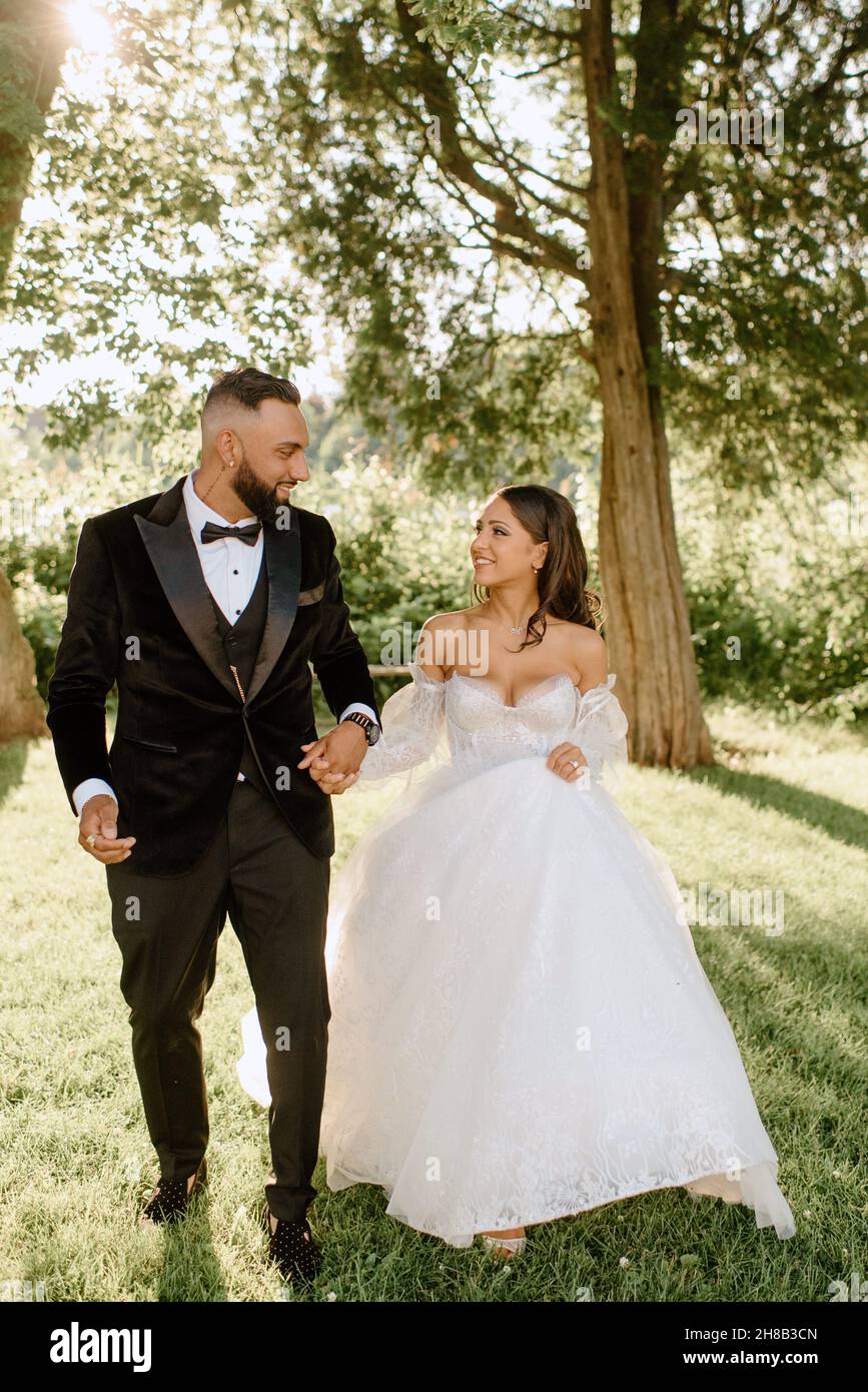 Back view bride walking in hi-res stock photography and images - Alamy
