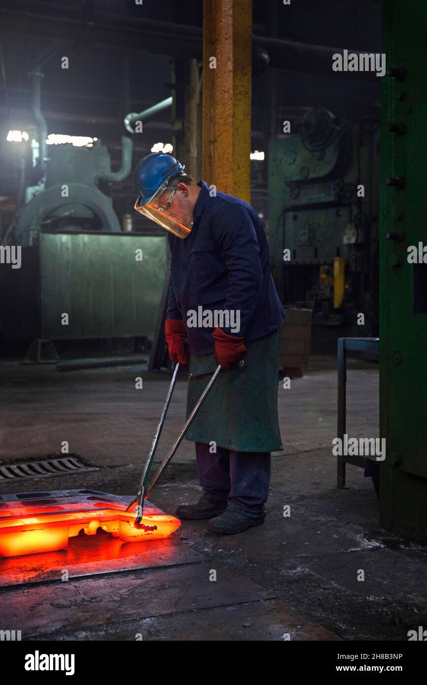 Fully forged and clipped flight bar (mining component) is lined up to ...