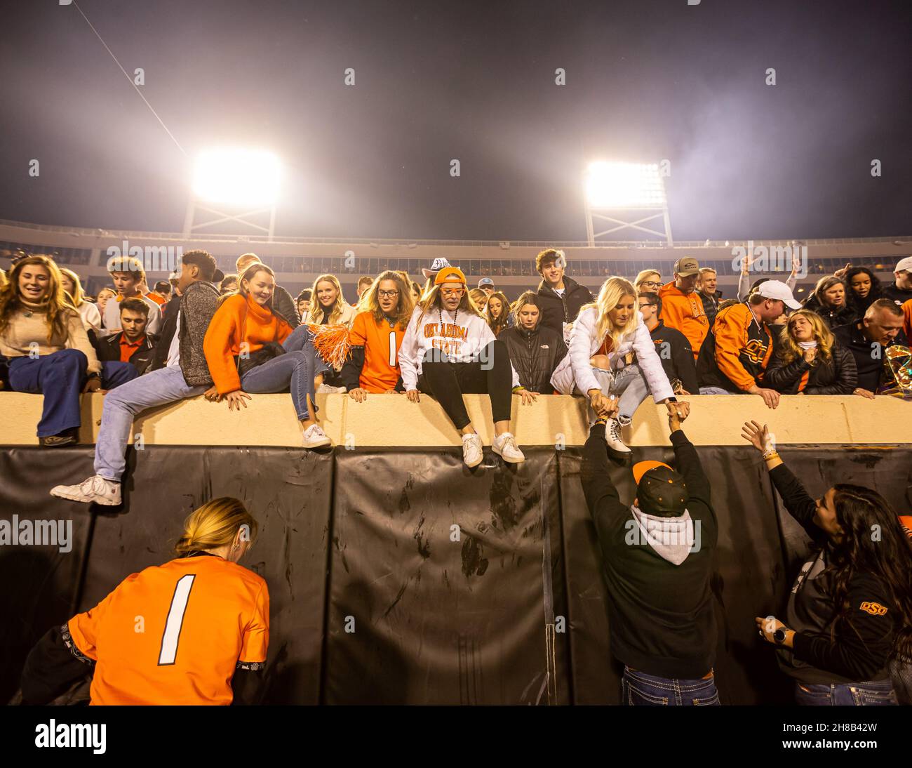 Stillwater, Oklahoma, USA. 27th Nov, 2021. Oklahoma State Cowboy fans ...