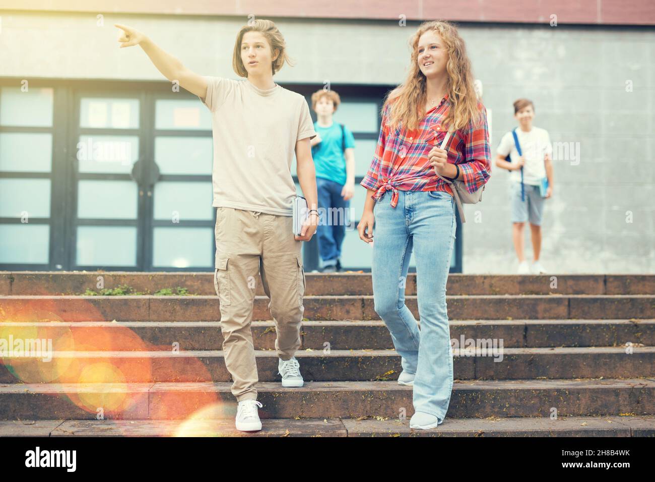 School boy walking out of school hi-res stock photography and images ...