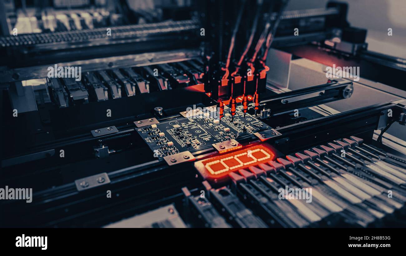 Digital technologies for automation of computer chip industry. Red neon ...