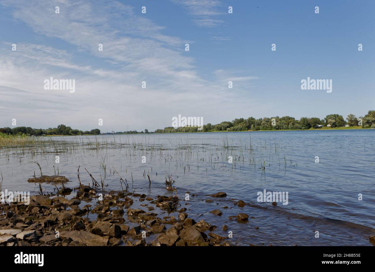 Shore of the Saint Lawrence river in east end Montreal. Quebec,Canada ...