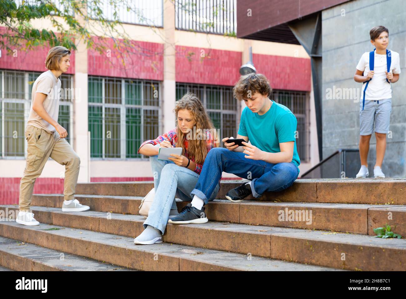 College students prepare together during recess Stock Photo - Alamy