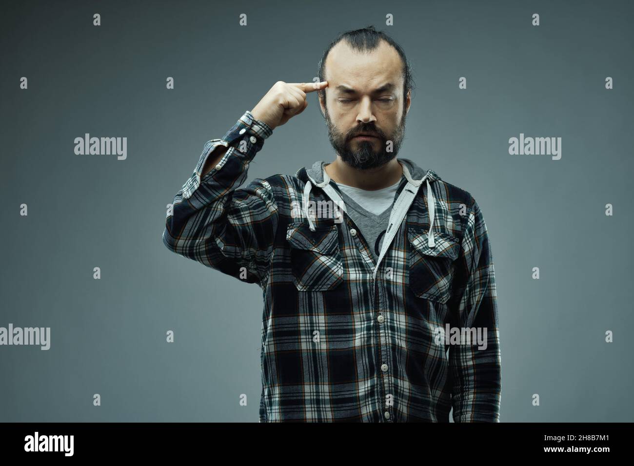 Man demonstrating the power of thought and mental concentration ...