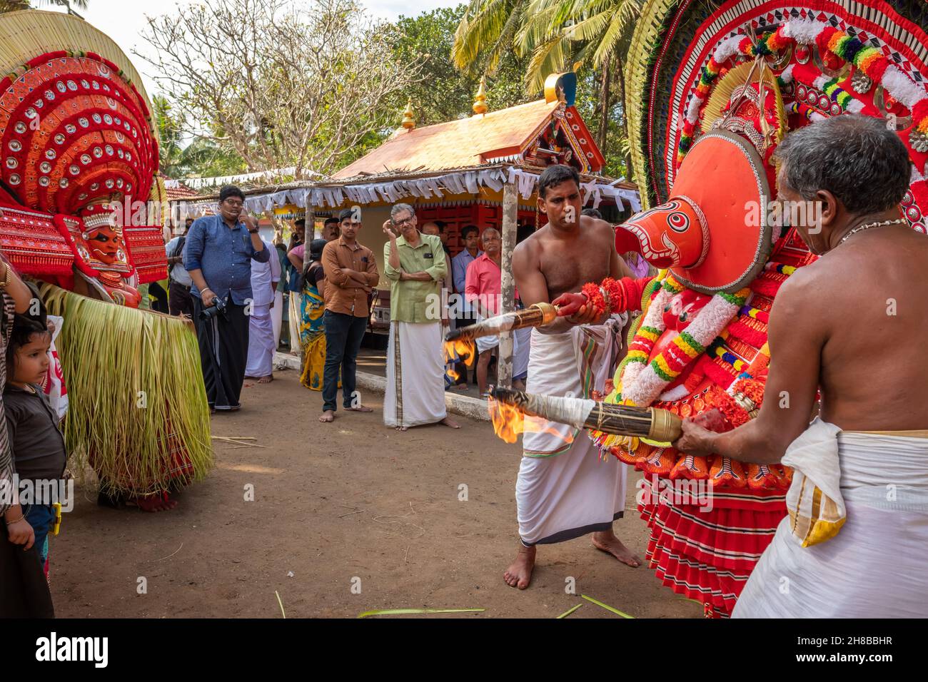 Theyyam artist perform during temple festival in Payyanur, Kerala ...