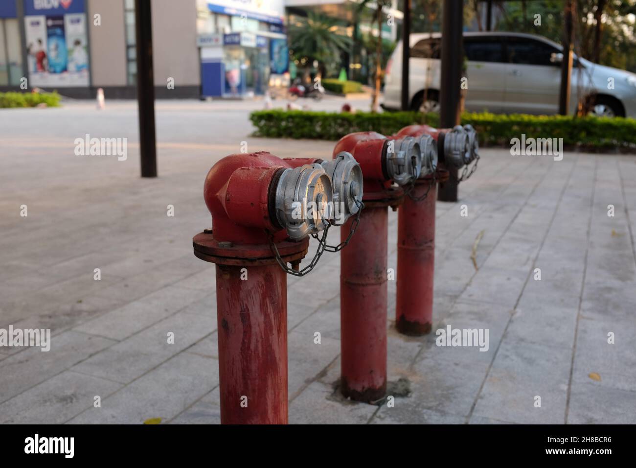 Waiting fire hydrants Stock Photo - Alamy