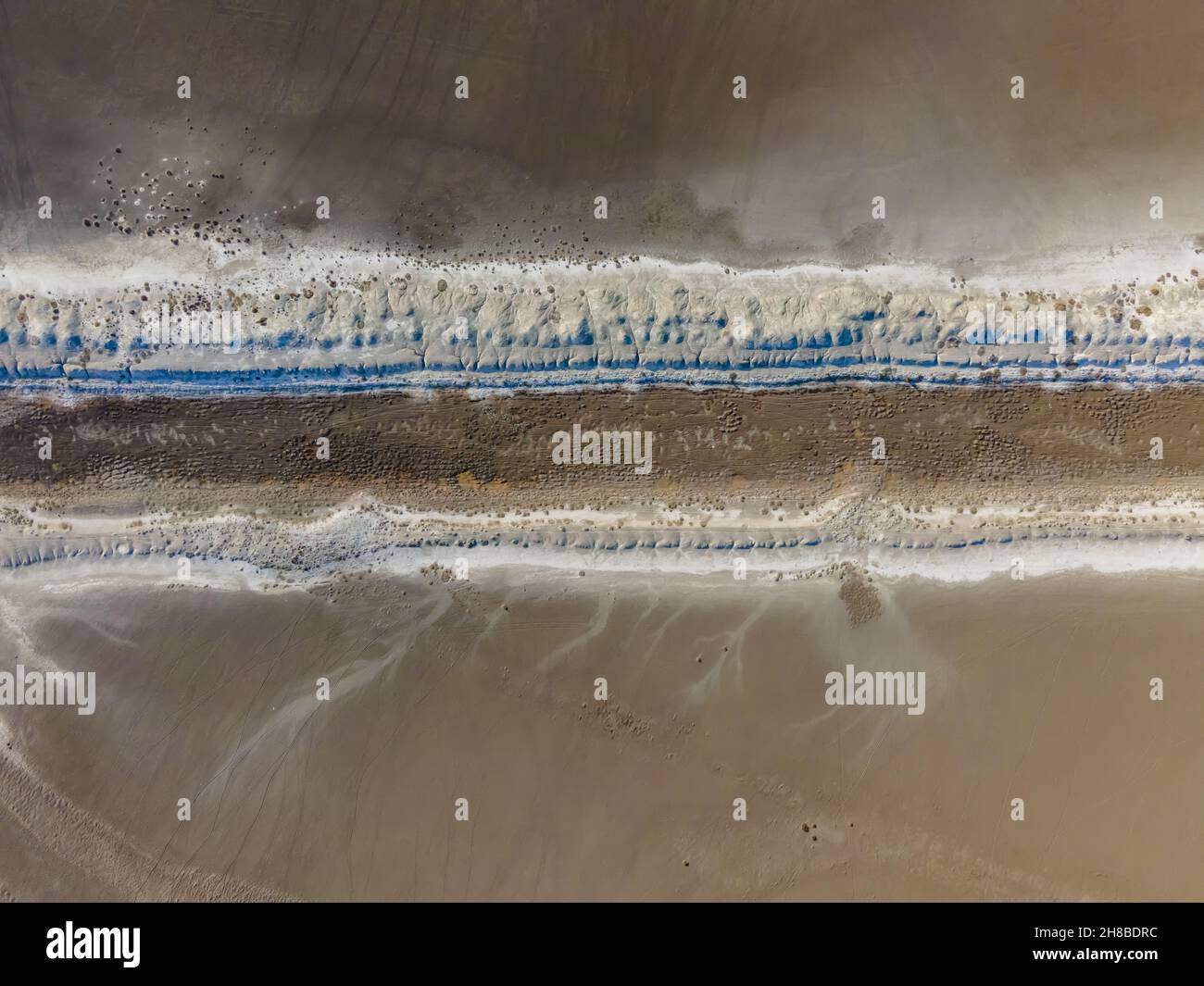 Aerial view of a dried-up riverbed as a result of global climate change ...