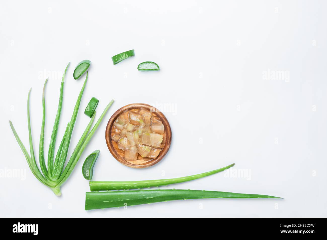 Flat lay aloe vera leaves, gel and slice on white background Stock ...