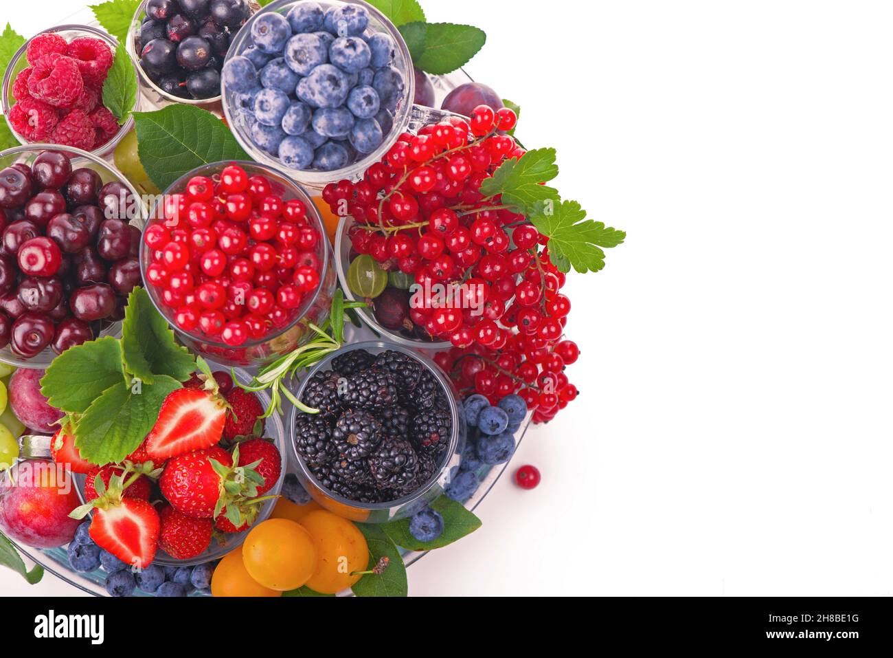 berry mix isolated on a white background Stock Photo - Alamy
