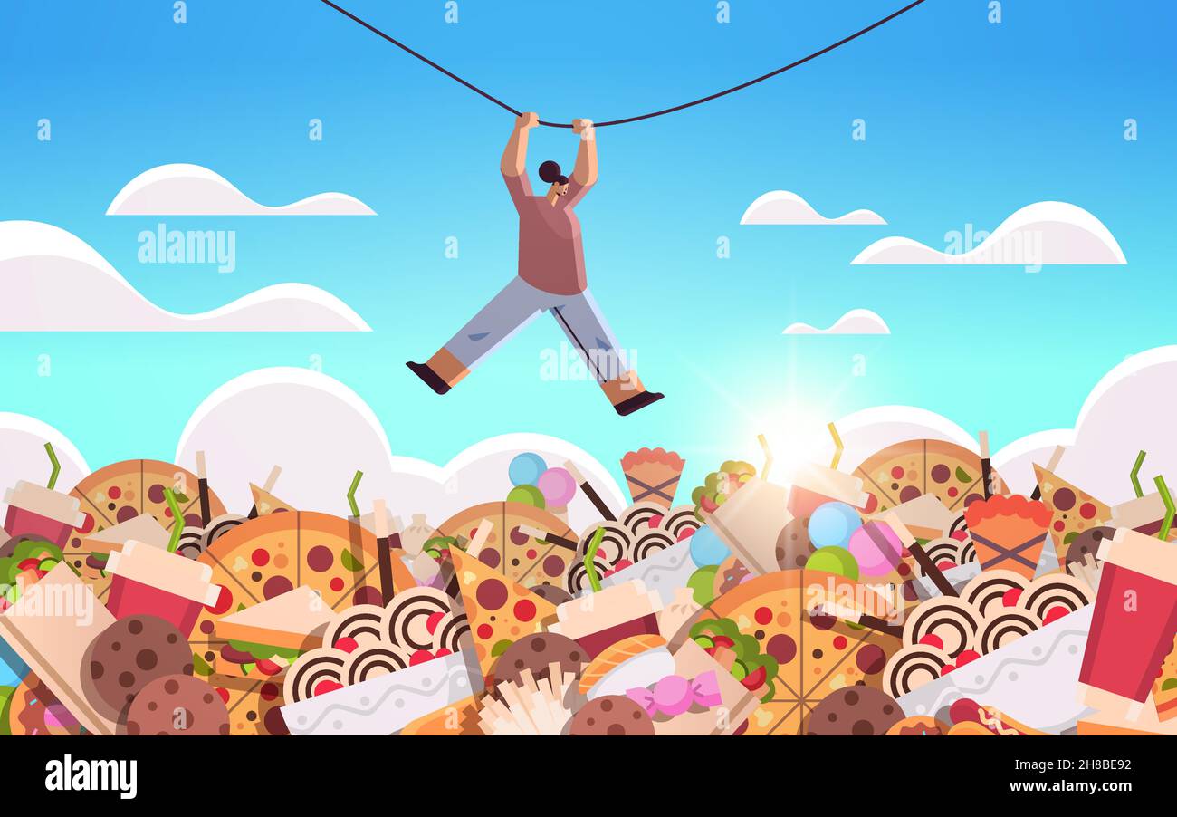 woman hanging rope above junk food assortment of fast food unhealthy ...