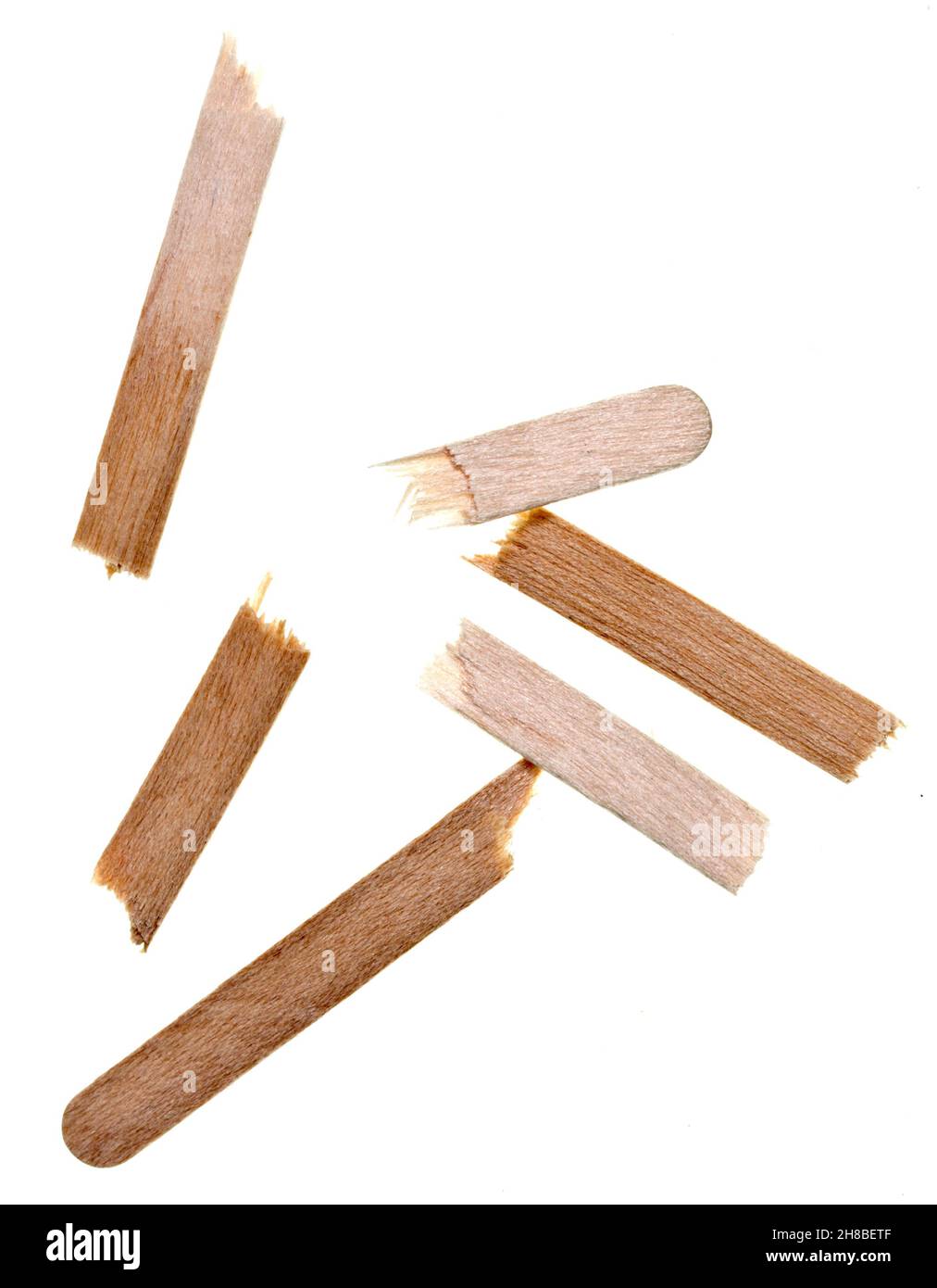 Broken sticks isolated on white background Stock Photo - Alamy
