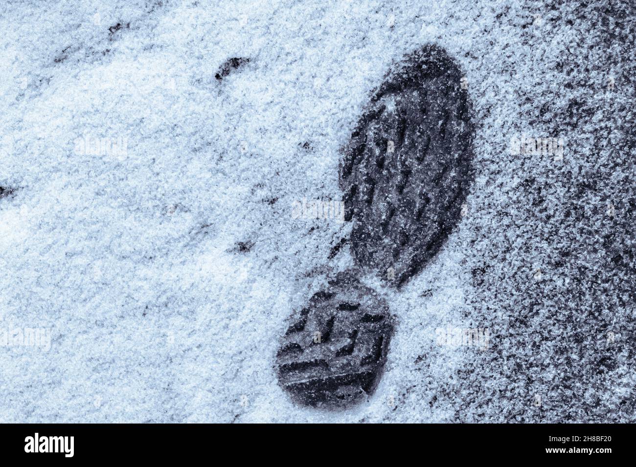 Close up footprint in snow. Background image for snow conditions Stock ...