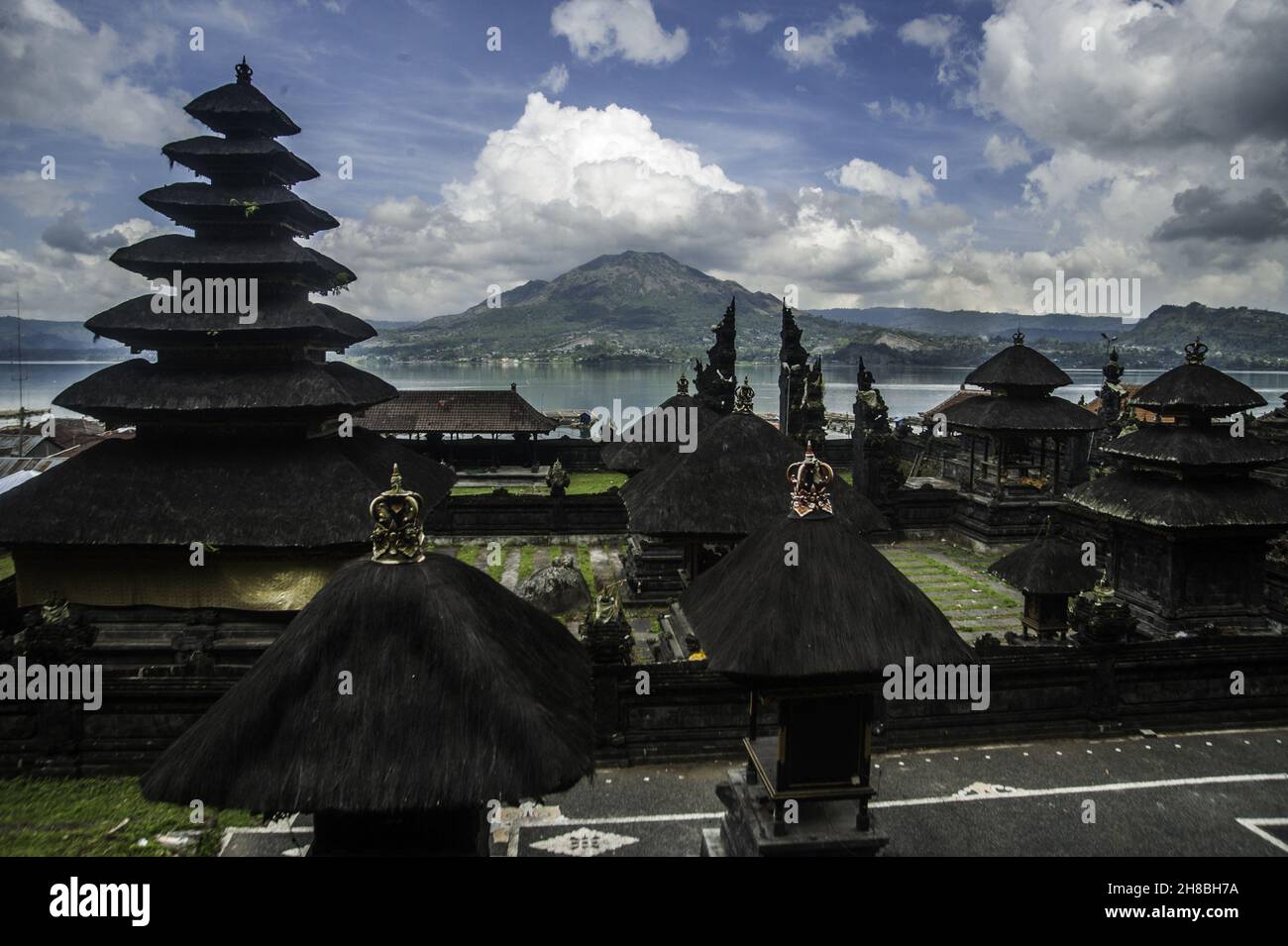 A temple of Terunyan village seen with Batur volcano as the background ...