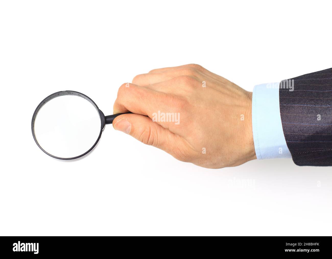 Magnifying glass in hand isolated on white background Stock Photo - Alamy
