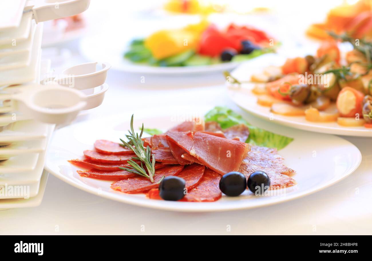 catering table set service with silverware and glass stemware at ...