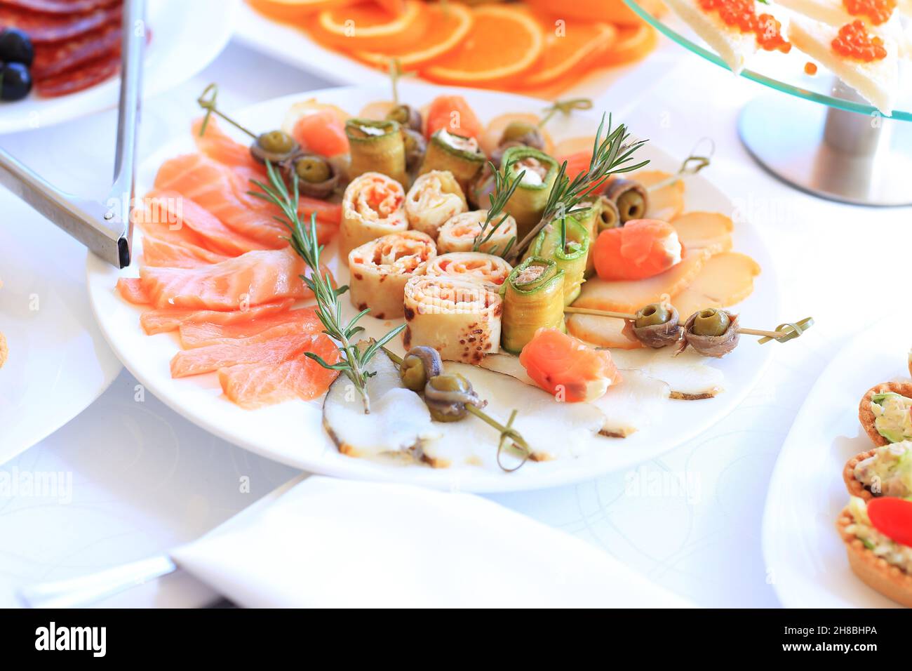 catering table set service with silverware and glass stemware at ...