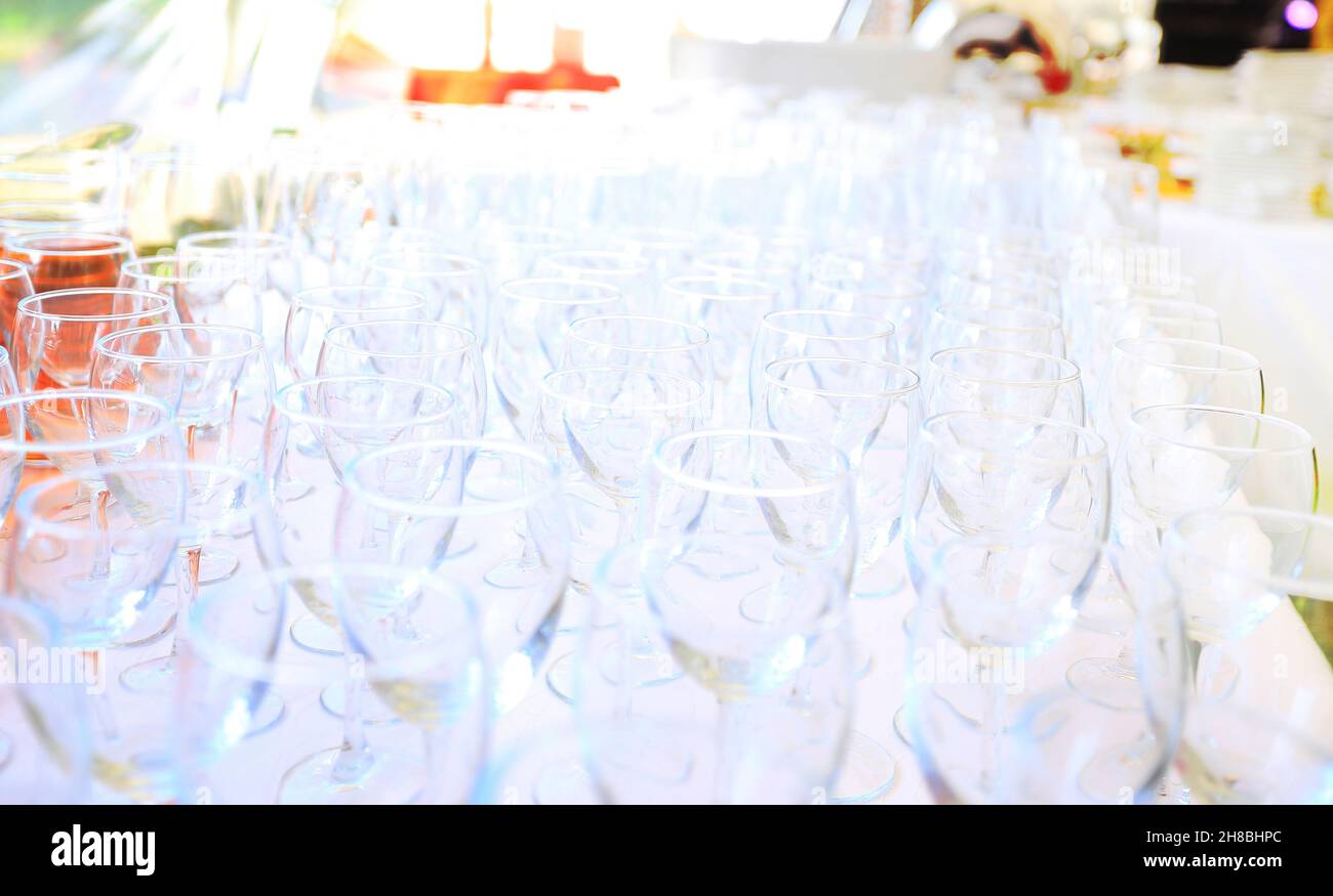 Empty wine glasses in the garden party Stock Photo - Alamy