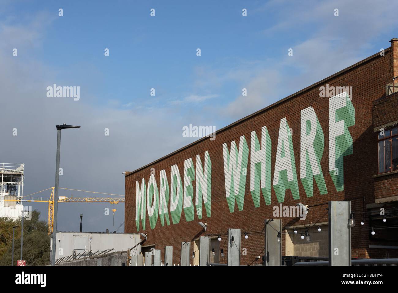 Sign saying Morden Wharf in large white and green letters, Greenwich ...