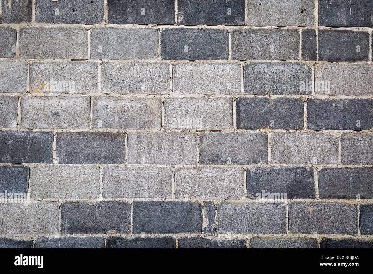 Gray brick block background Stock Photo - Alamy