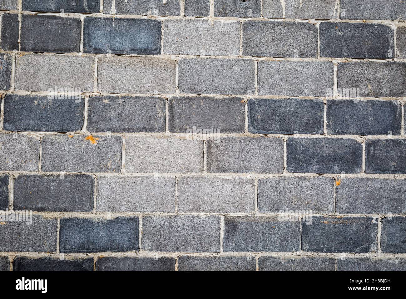 Gray brick block background hi-res stock photography and images - Alamy
