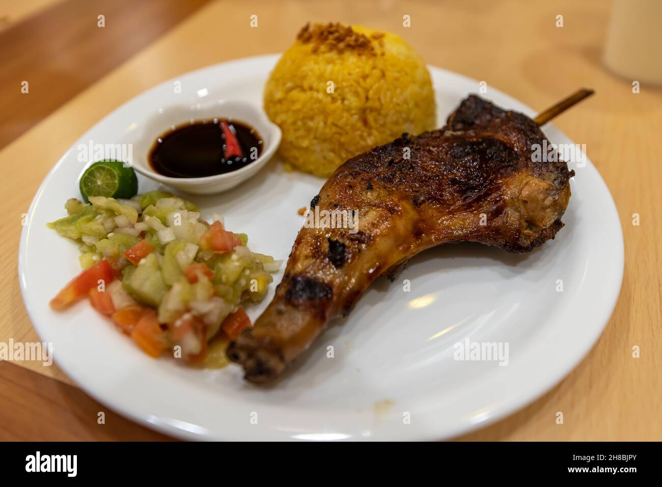Popular Filipino food chicken inasal at the Restaurant Stock Photo - Alamy