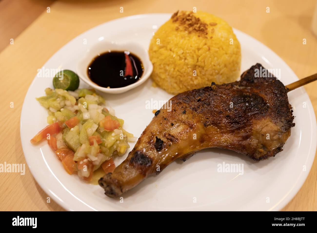 Popular Filipino food chicken inasal at the Restaurant Stock Photo - Alamy