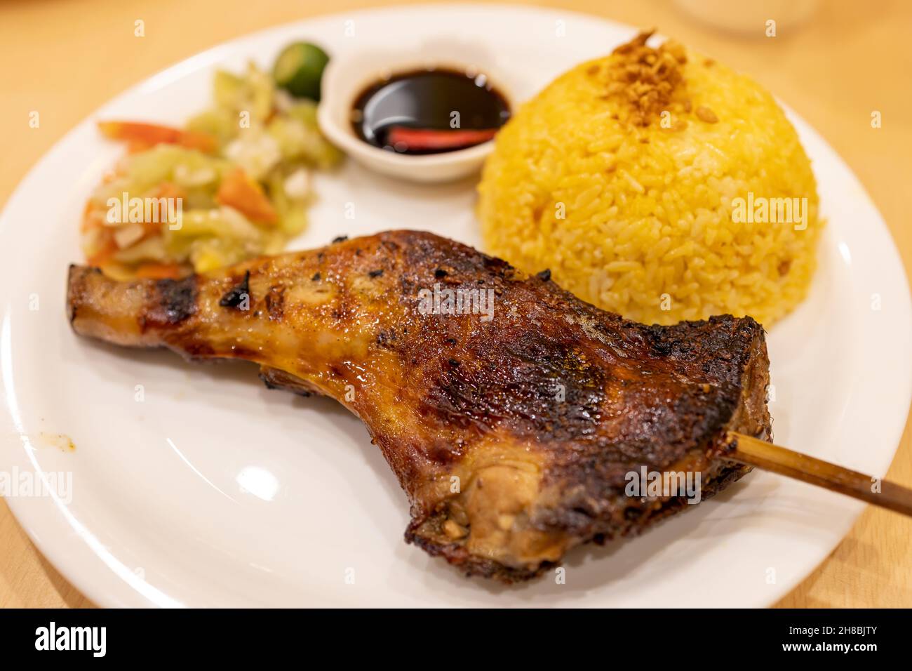 Popular Filipino food chicken inasal at the Restaurant Stock Photo - Alamy