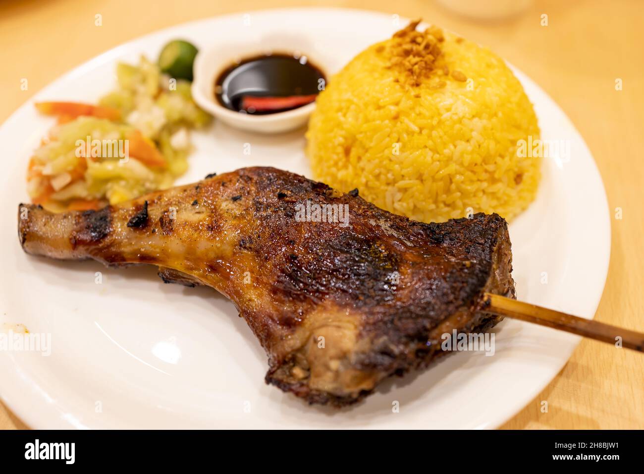 Popular Filipino food chicken inasal at the Restaurant Stock Photo - Alamy