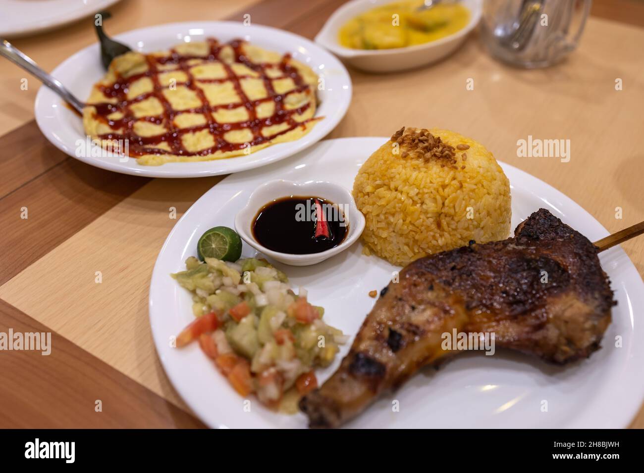 Popular Filipino food chicken inasal at the Restaurant Stock Photo - Alamy