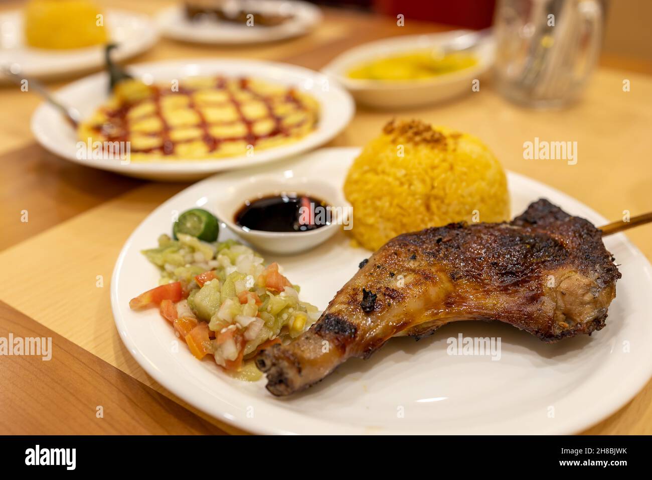 Popular Filipino food chicken inasal at the Restaurant Stock Photo - Alamy