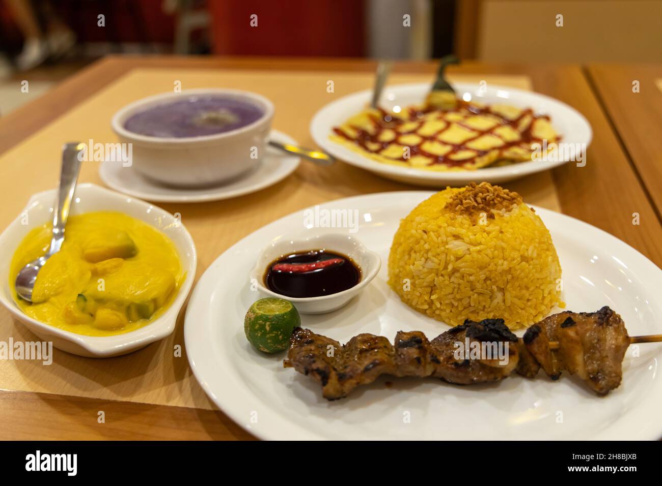 Popular Filipino food pork inasal with Java rice at Restaurant Stock ...